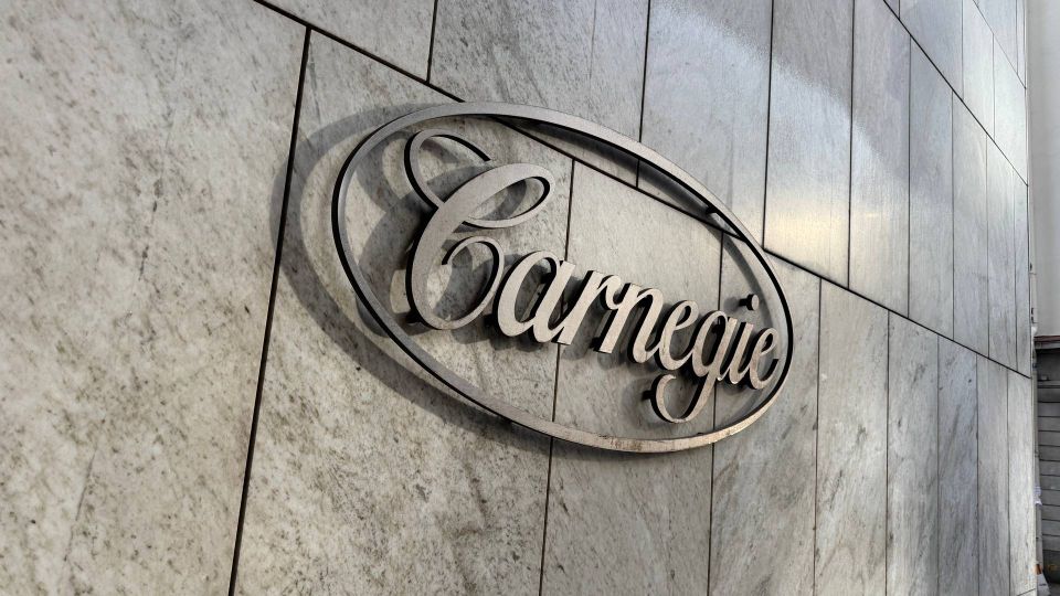 DNB höjer prognosen för Carnegies resultatbidrag