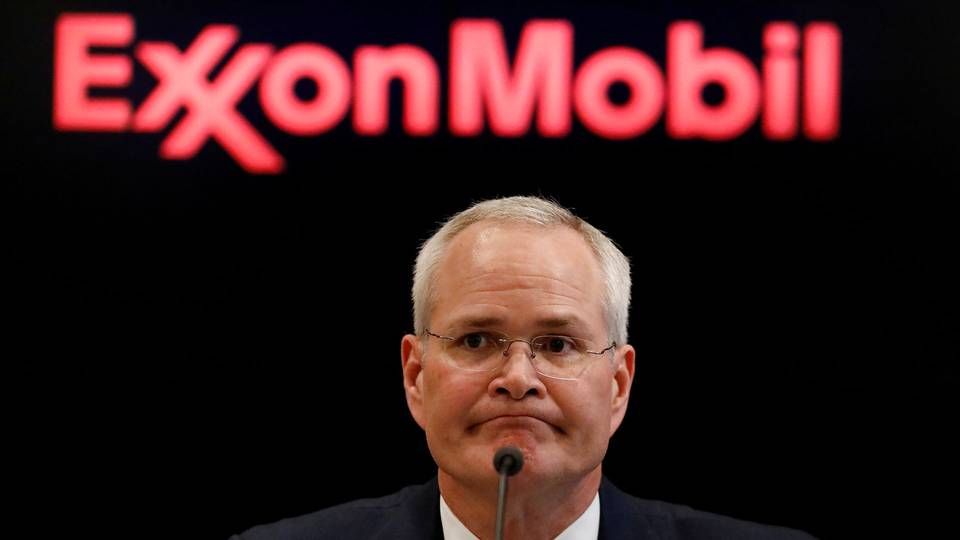 Exxon Mobil reports big net loss and downsizes